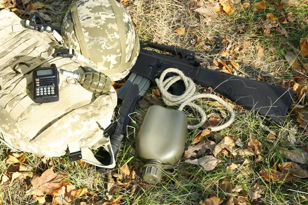 Military set on grass Stock Photo by ©belchonock 135088540