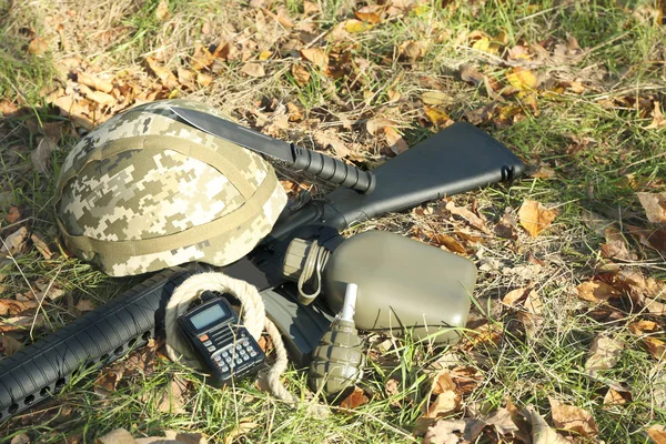 Military set on grass Stock Photo by ©belchonock 135088540