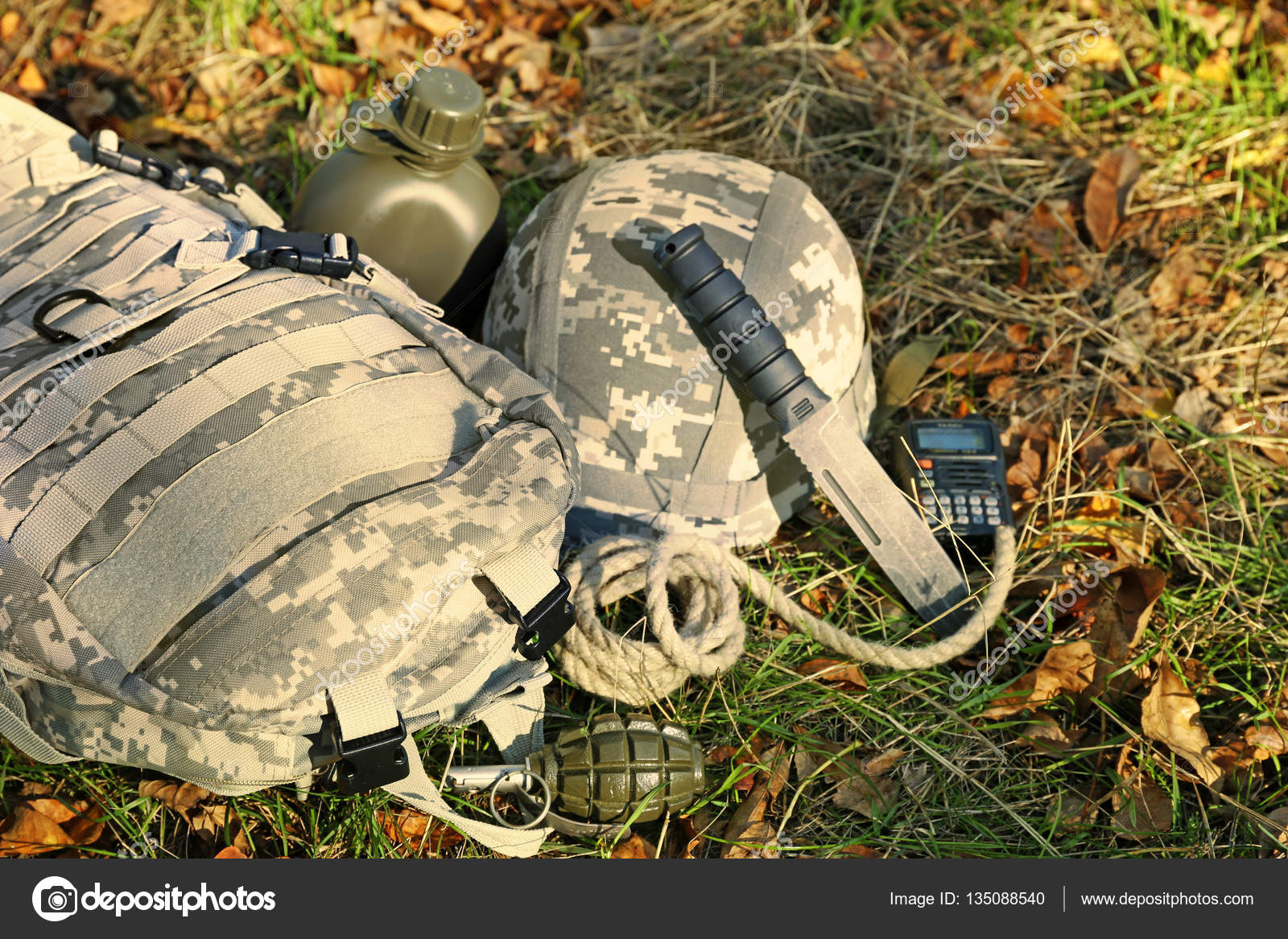 Military set on grass Stock Photo by ©belchonock 135088540