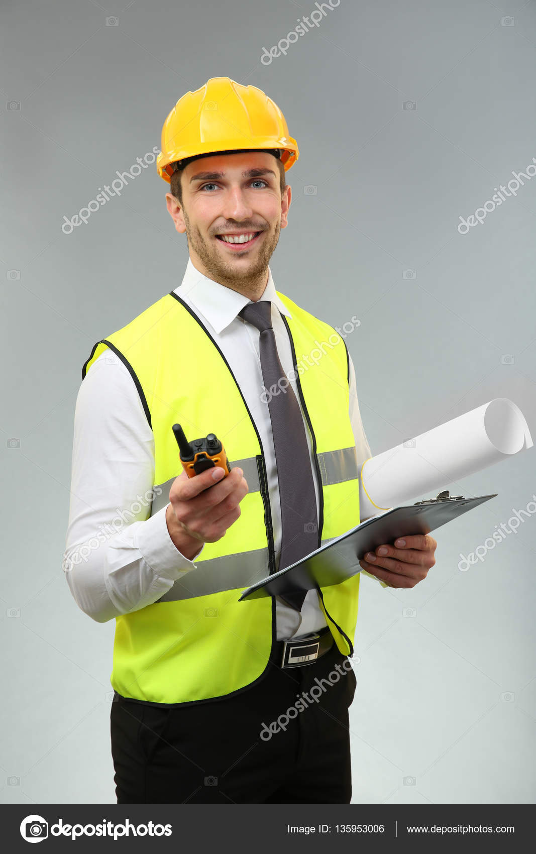 Engineer with portable radio transmitter — Stock Photo © belchonock ...