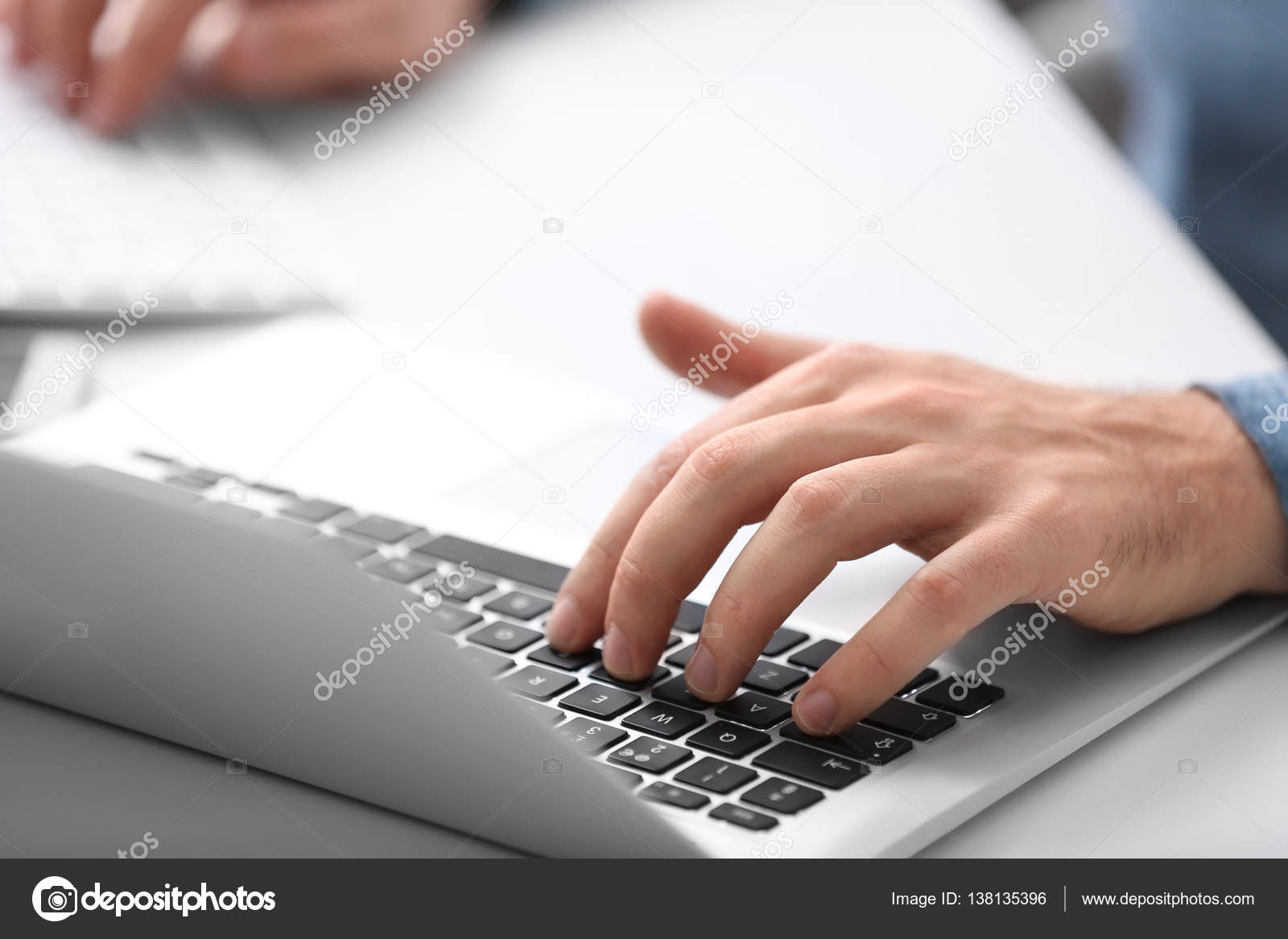 Programmer working with laptop Stock Photo by ©belchonock 138135396