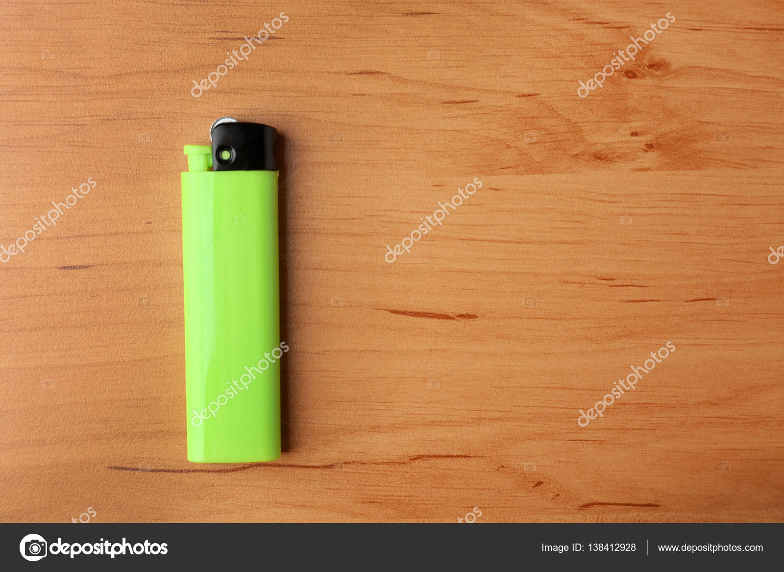Green gas lighter Stock Photo by ©belchonock 138412928