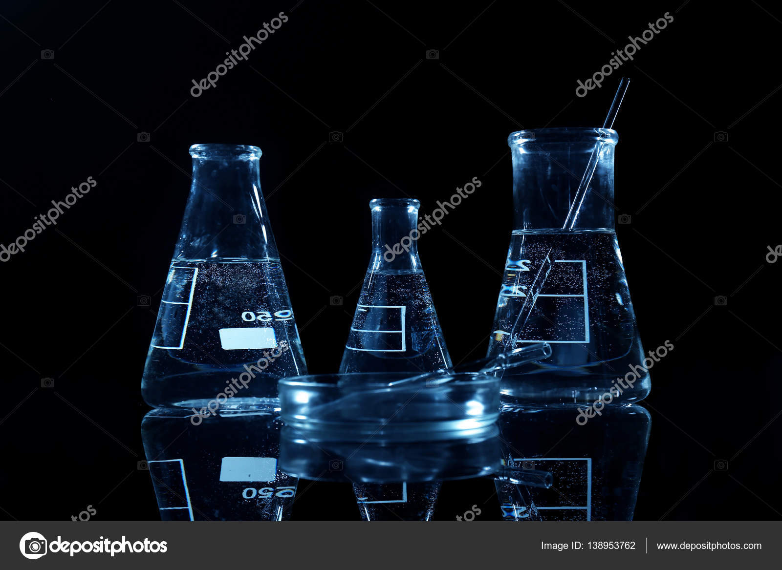 Test beakers and flasks — Stock Photo © belchonock #138953762