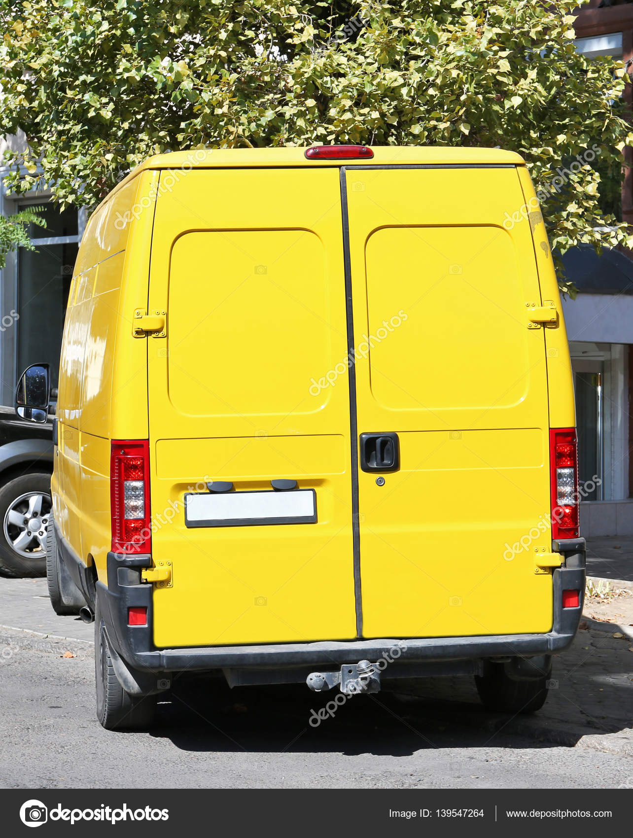 Yellow delivery car — Stock Photo © belchonock #139547264