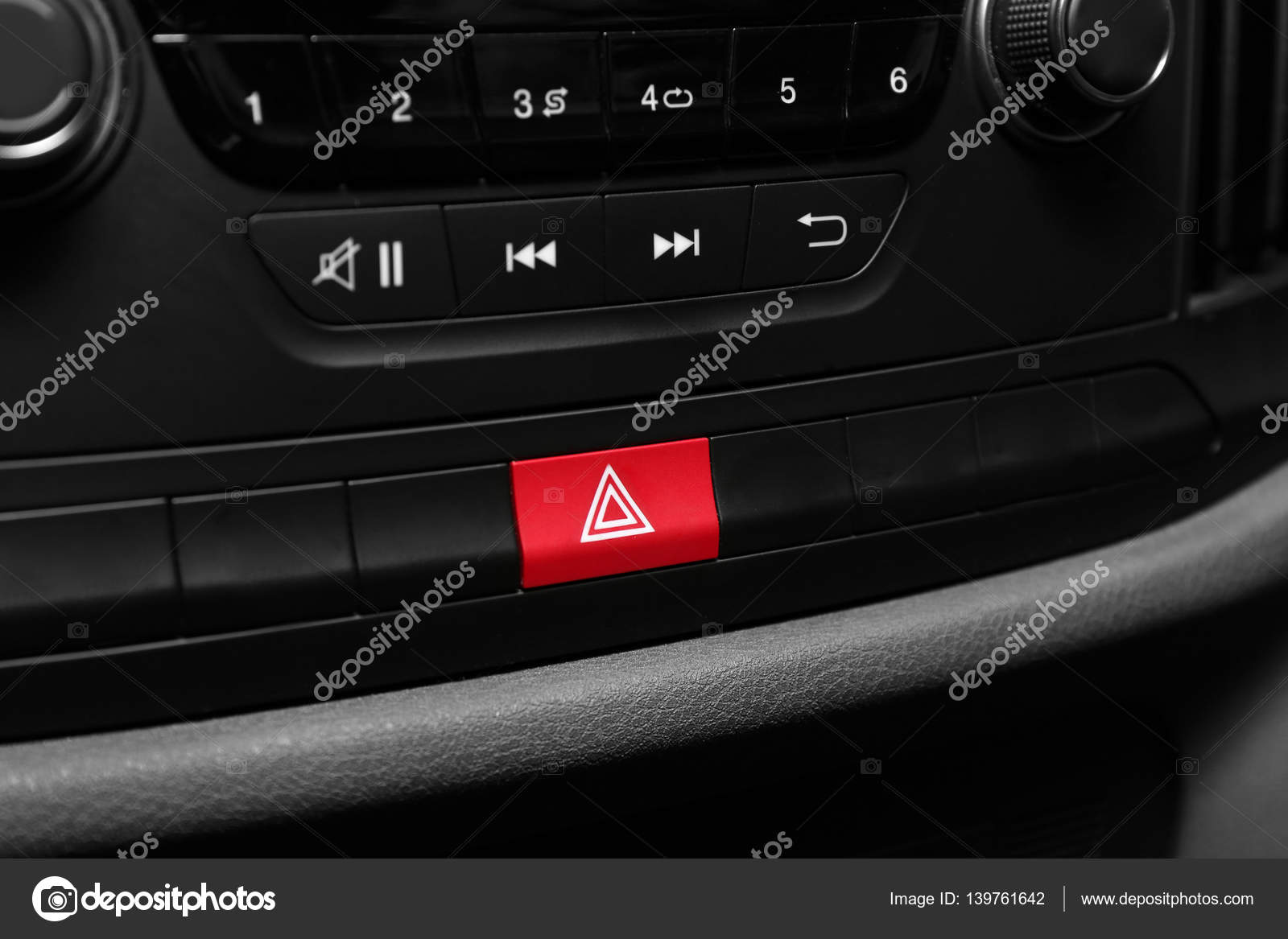 Warning button on car console Stock Photo by ©belchonock 139761642