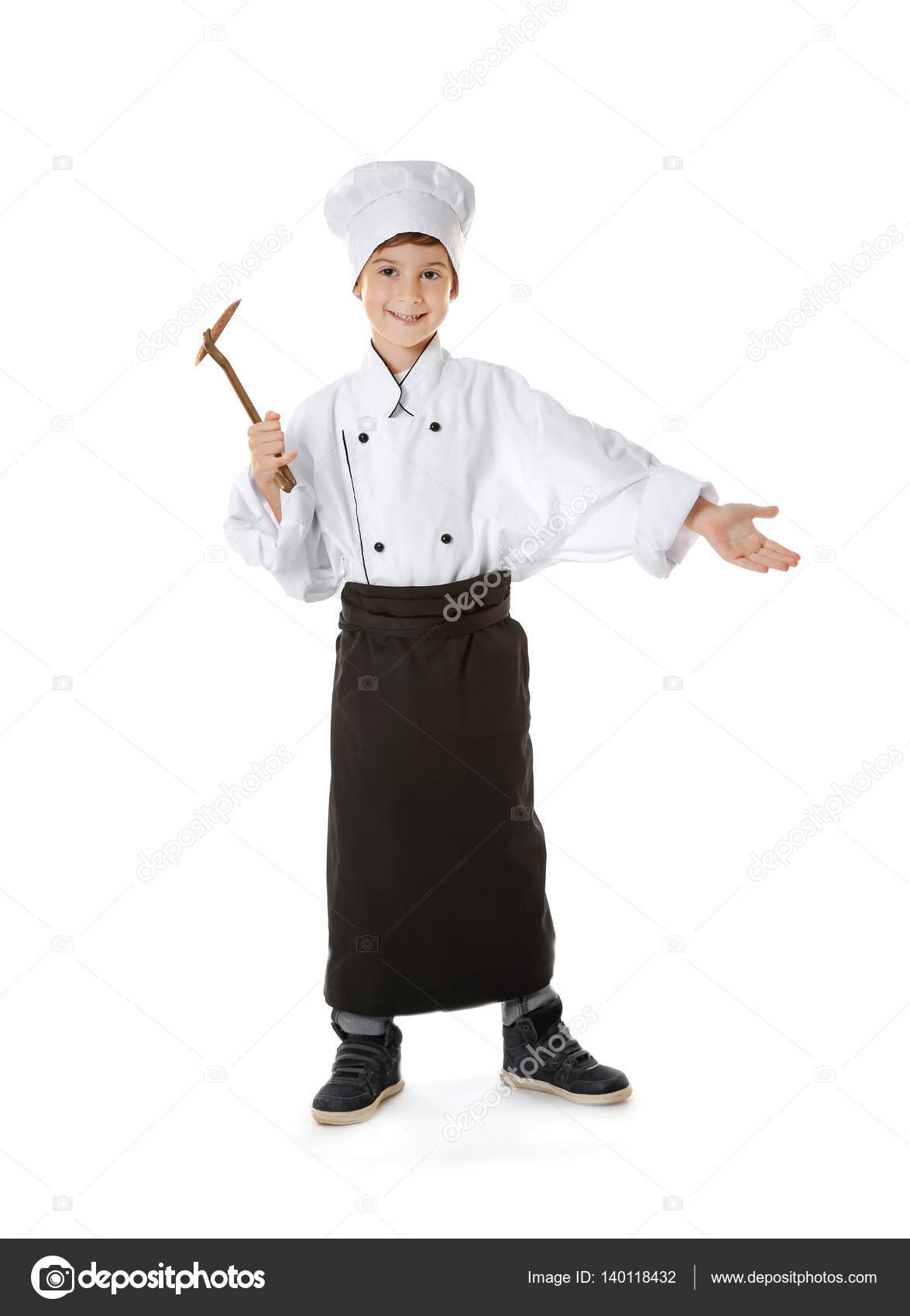 Cute boy in chef uniform Stock Photo by ©belchonock 140118432