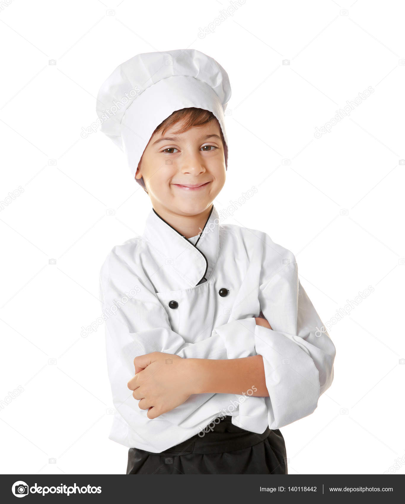 Cute boy in chef uniform Stock Photo by ©belchonock 140118442