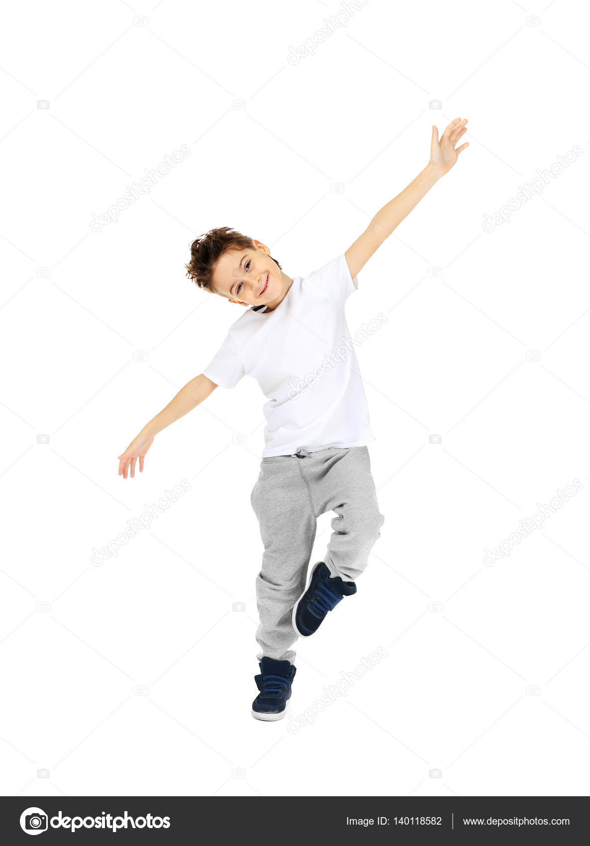 Cute boy dancing Stock Photo by ©belchonock 140118582