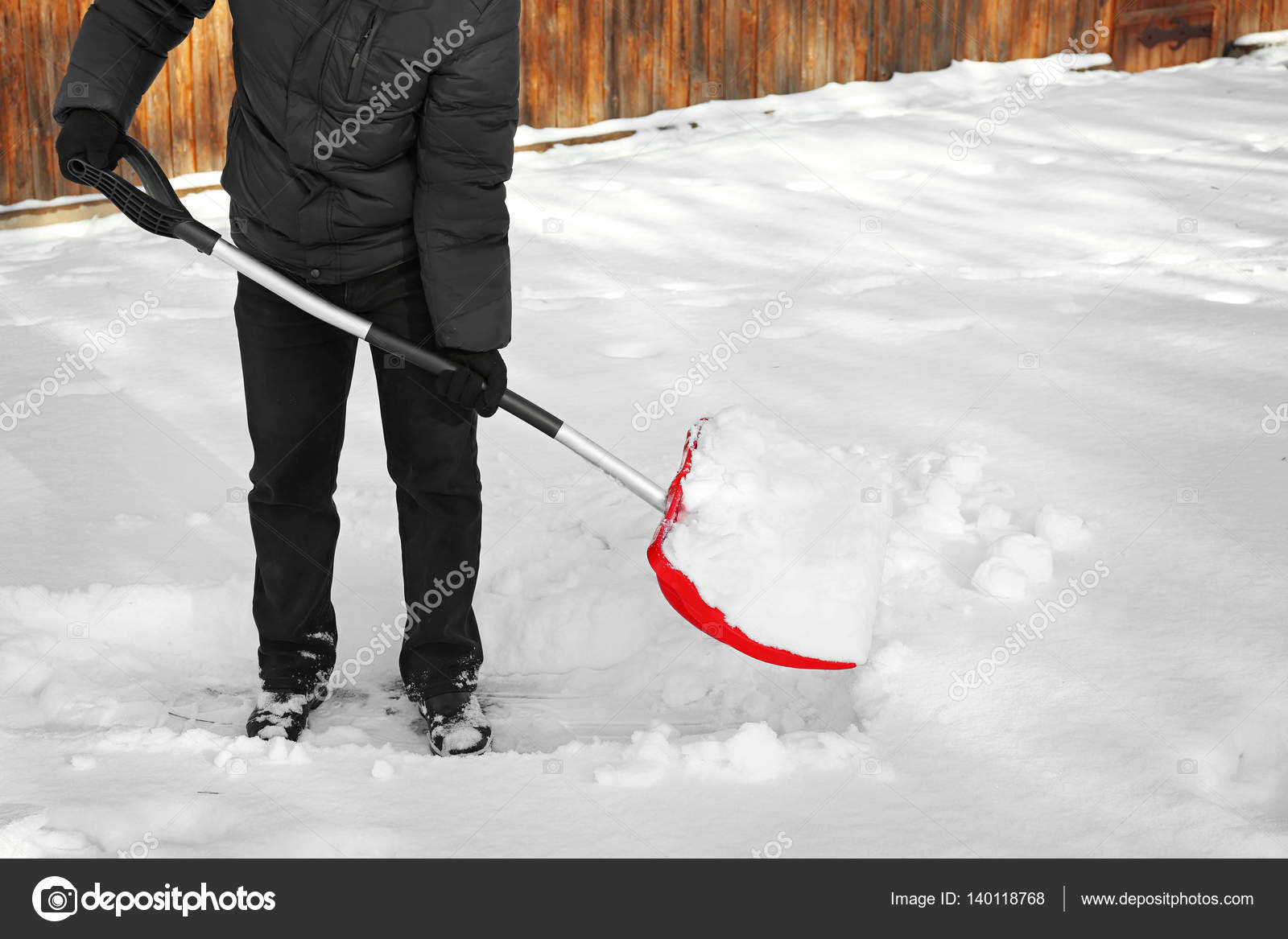 Man removing snow — Stock Photo © belchonock #140118768 Man removing snow — Stock Photo © belchonock #140118768
