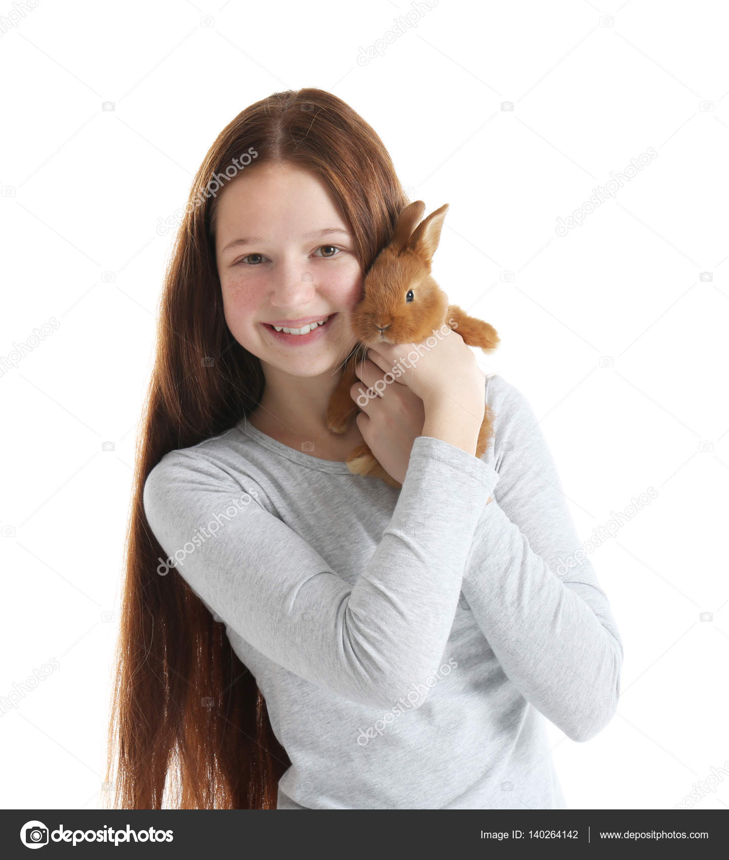 Cute girl holding rabbit Stock Photo by ©belchonock 140264142