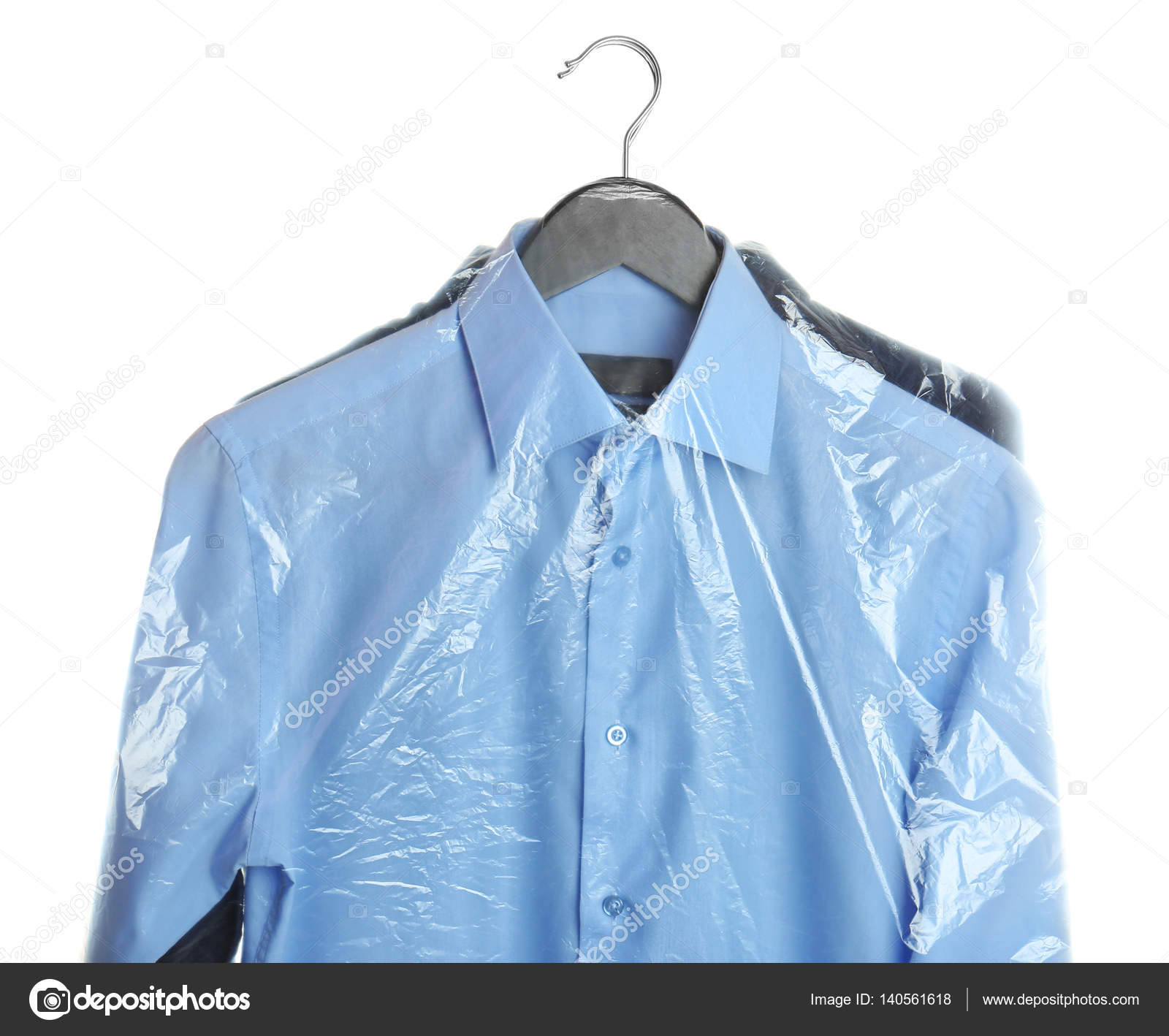 Clean clothes from dry-cleaning Stock Photo by ©belchonock 140561618