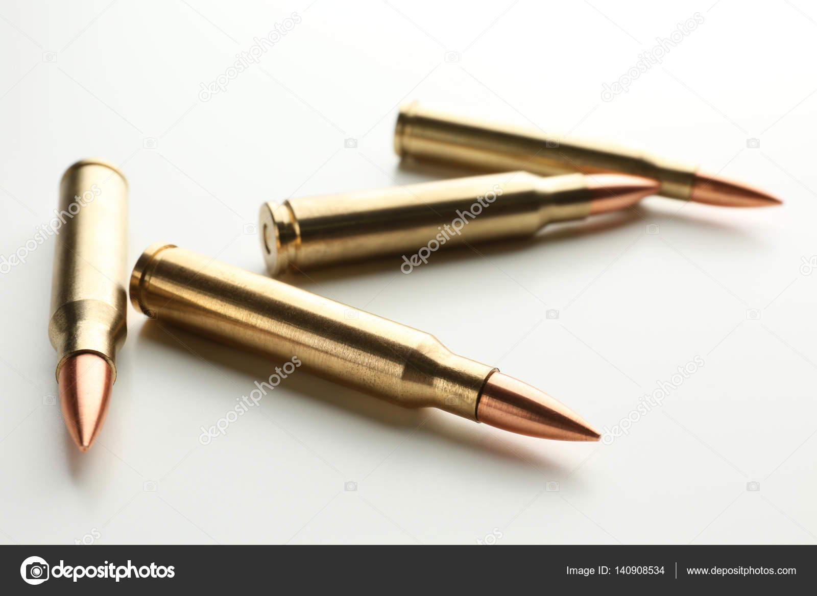 Rifle bullets on background Stock Photo by ©belchonock 140908534