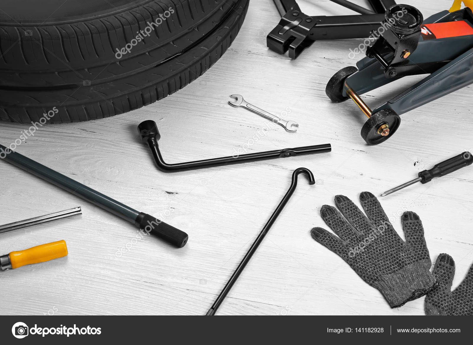 Car wheel with tools ⬇ Stock Photo, Image by © belchonock #141182928