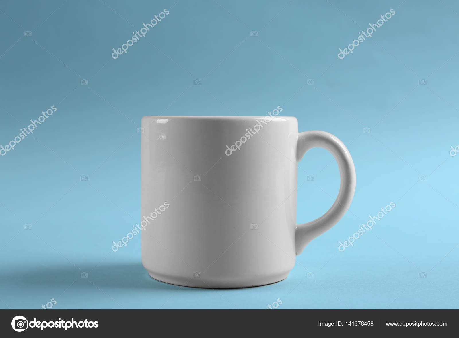 Blank ceramic cup on color background Stock Photo by ©belchonock 141378458