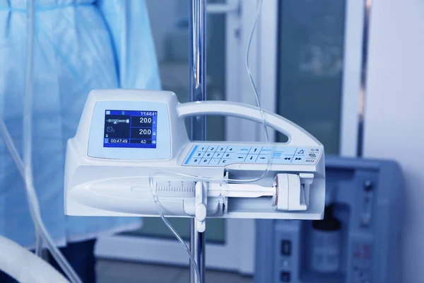 Controlled syringe pump Stock Photo by ©belchonock 137595648