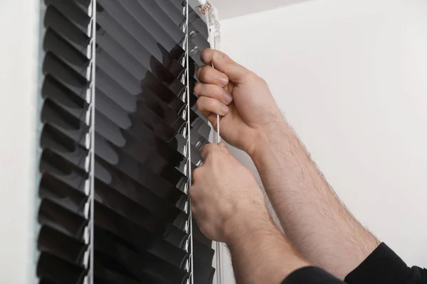 Installing window blinds Stock Photos, Royalty Free Installing window ...