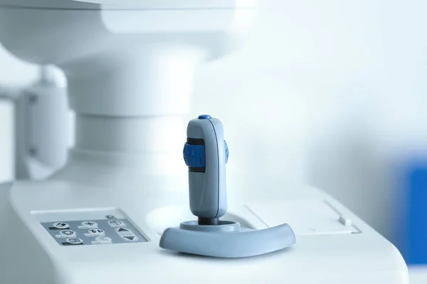 Fundus camera in medical office Stock Photo by ©belchonock 147115863