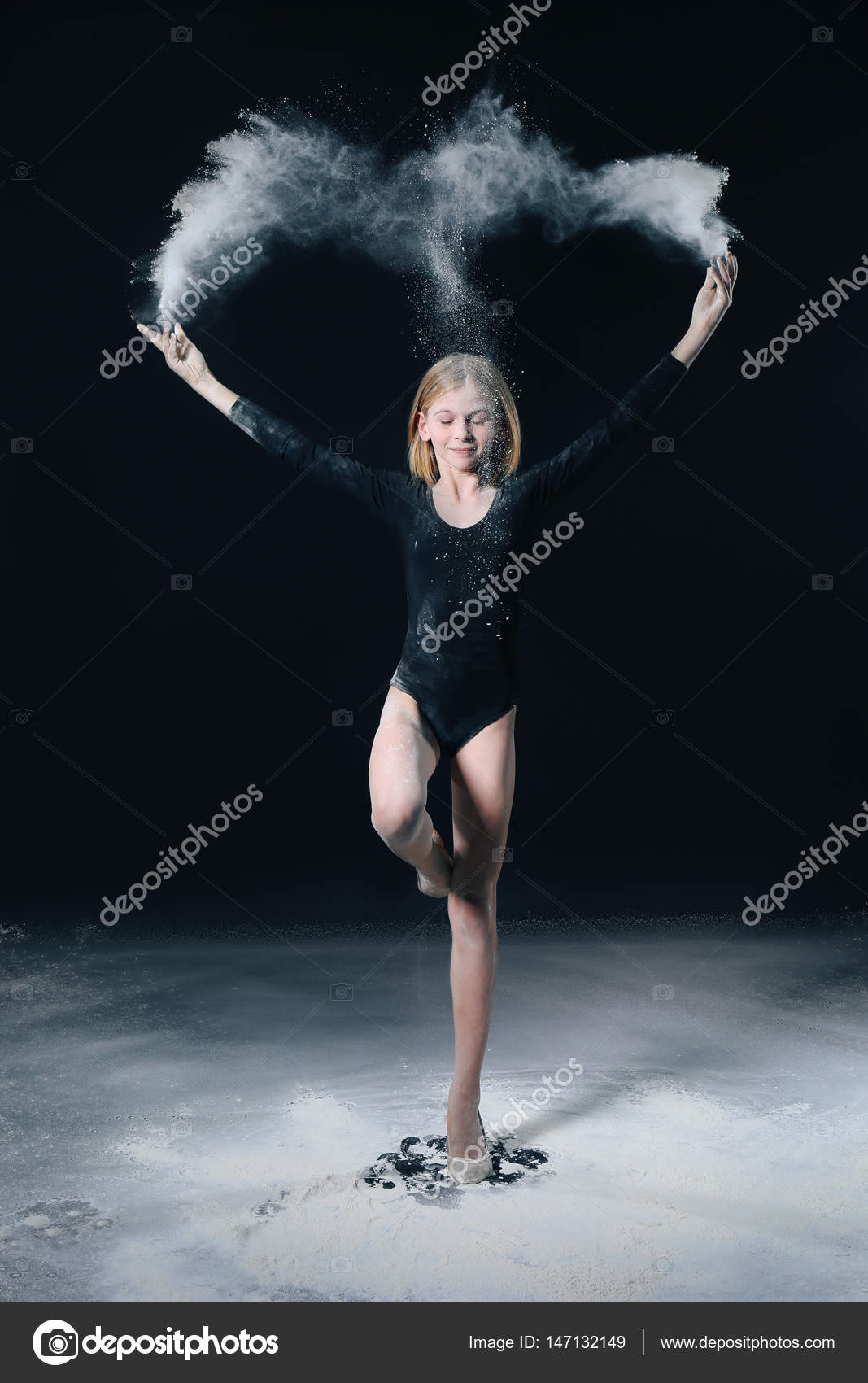 Little cute girl with white powder Stock Photo by ©belchonock 147132149