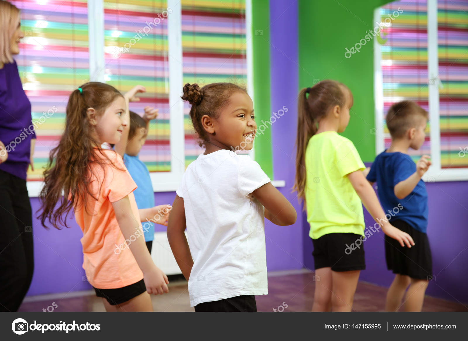 Children dancing in choreography class Stock Photo by ©belchonock 147155995