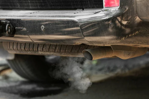 Combustion gas from car exhaust pipe, closeup | Stock Images Page ...