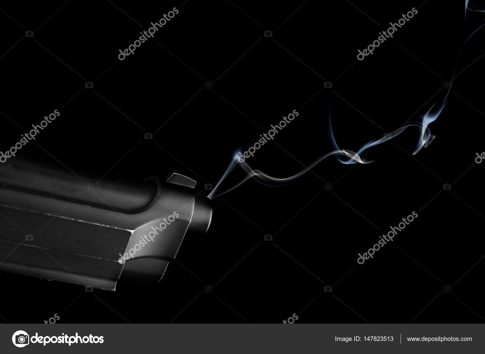 Smoking gun on black Stock Photo by ©belchonock 147823513