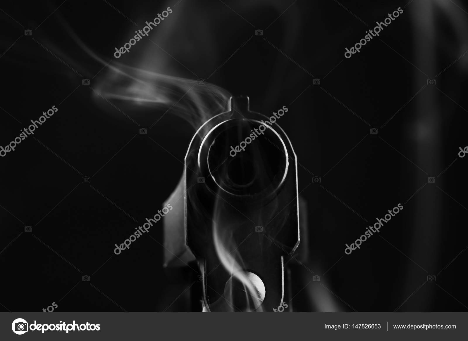 Smoking gun on black — Stock Photo © belchonock #147826653