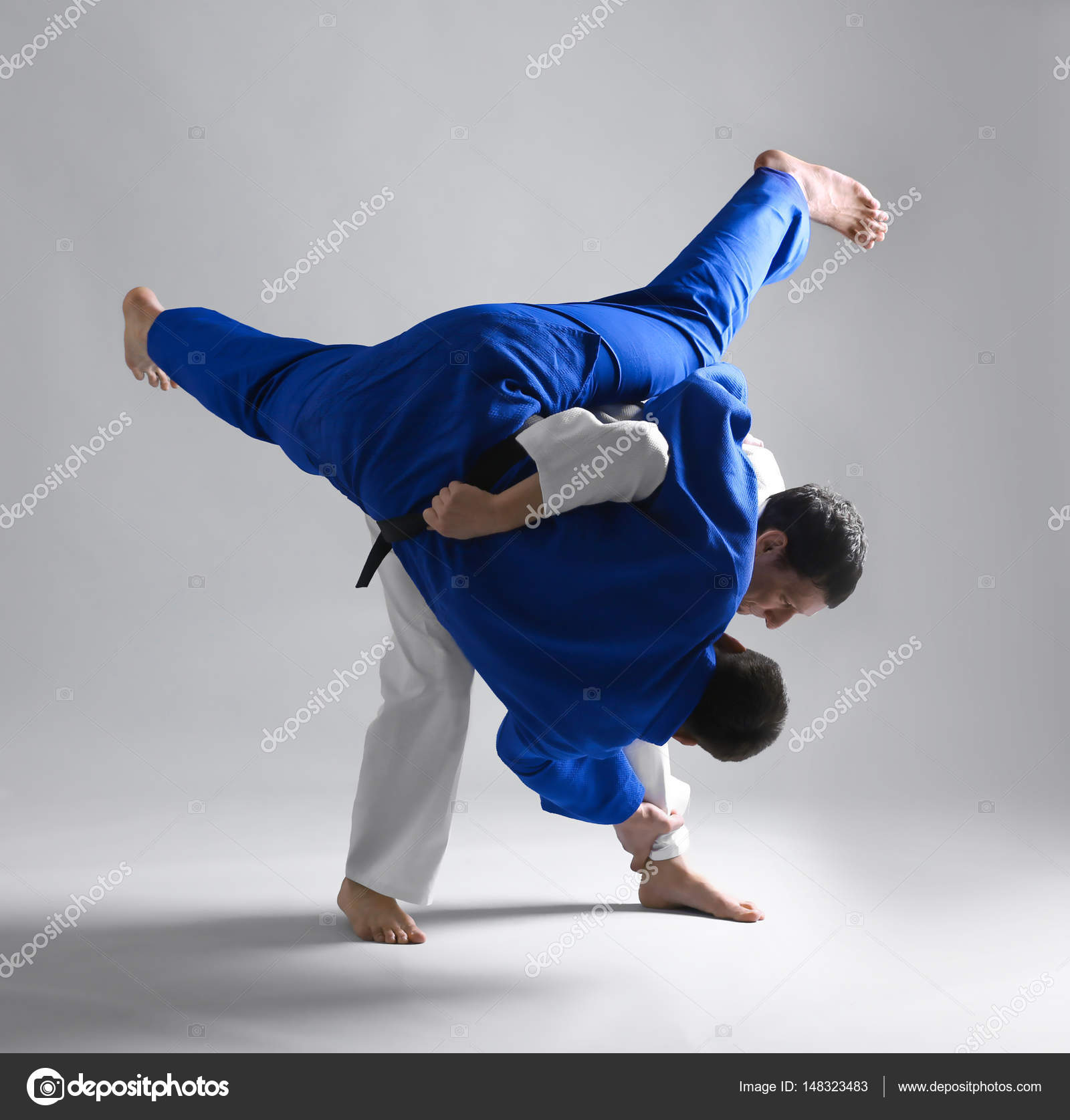 Men practicing martial arts — Stock Photo © belchonock #148323483