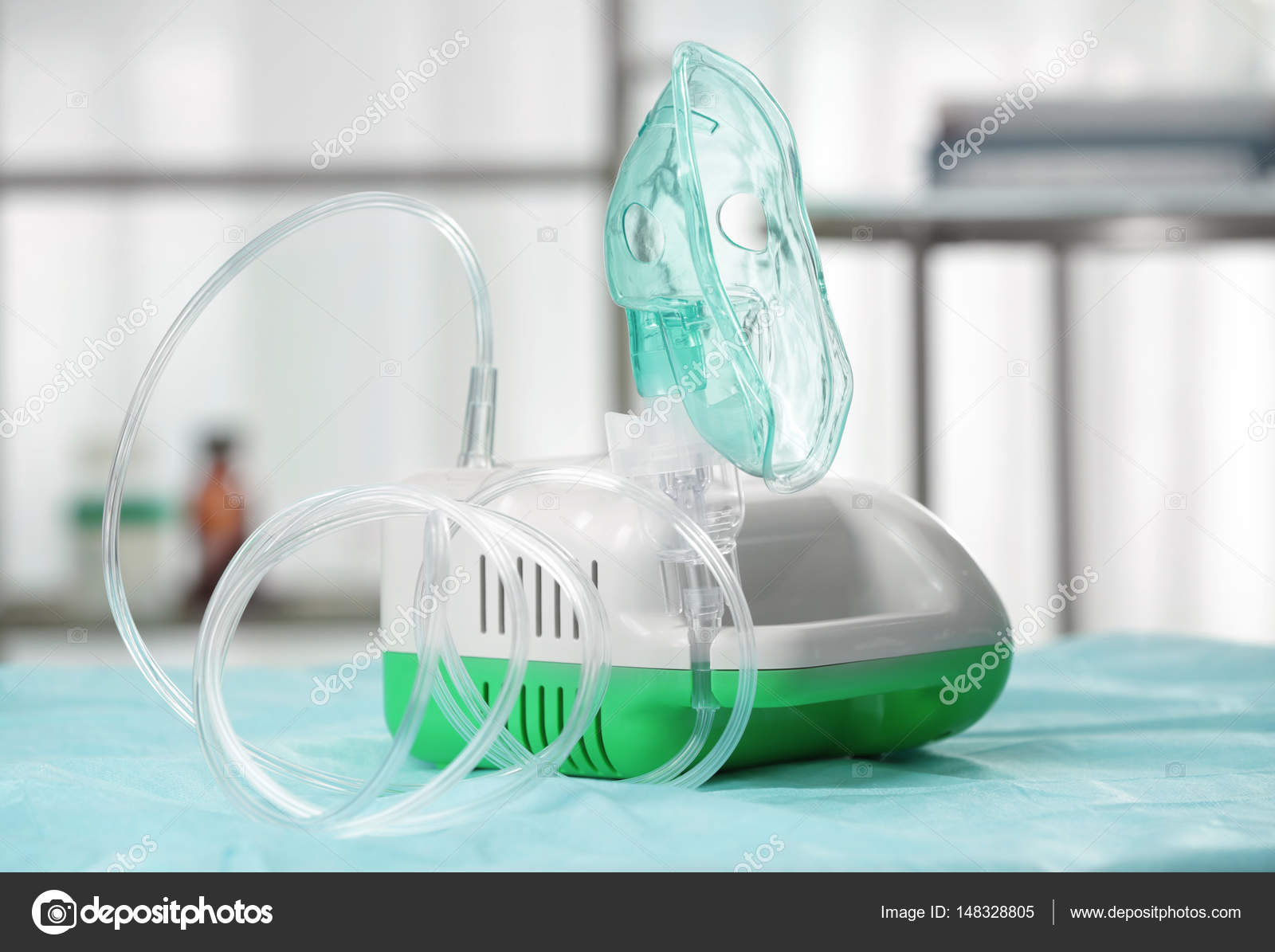 Compressor nebulizer with mask on table — Stock Photo © belchonock ...