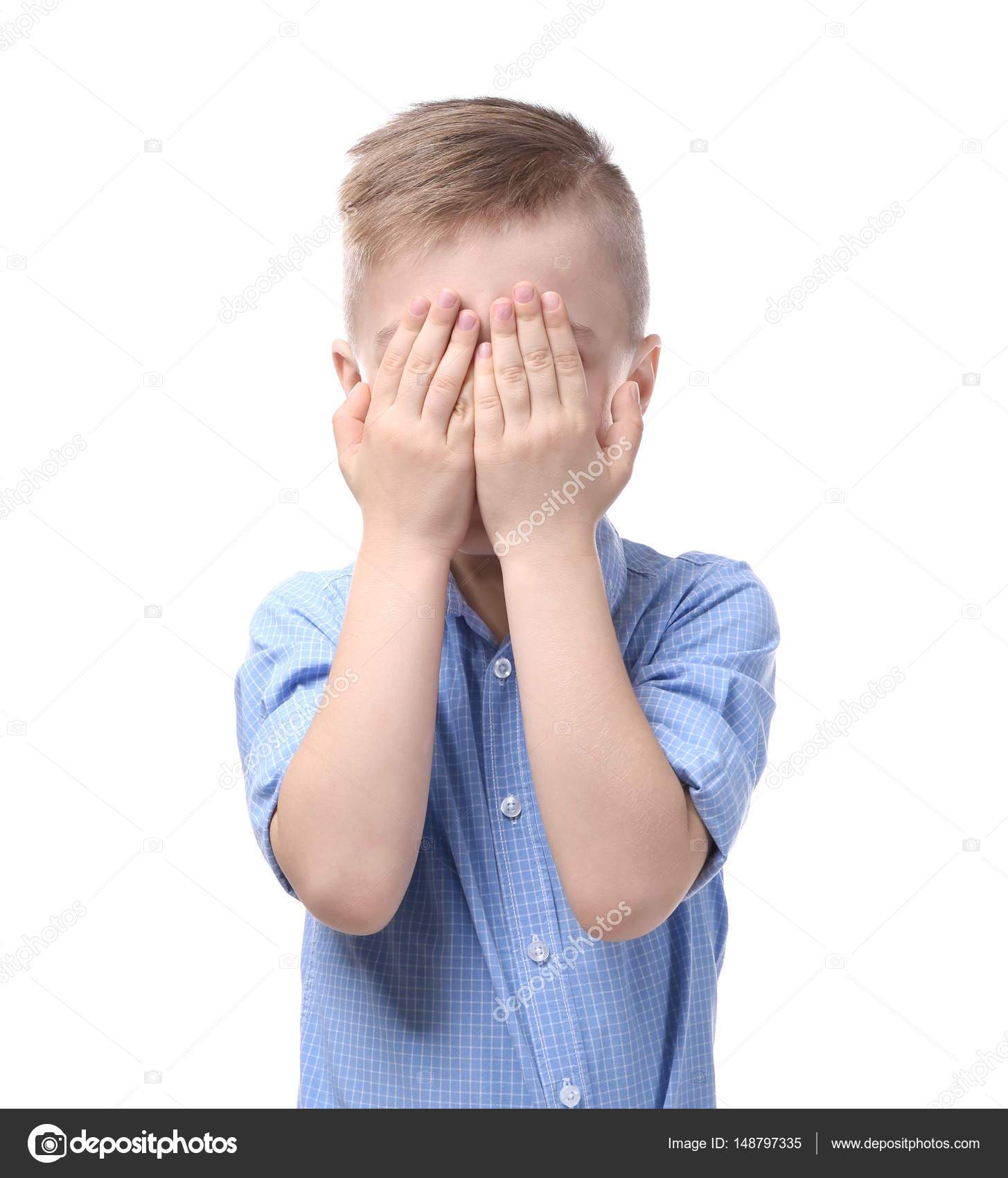 Little boy covering face with hands Stock Photo by ©belchonock 148797335