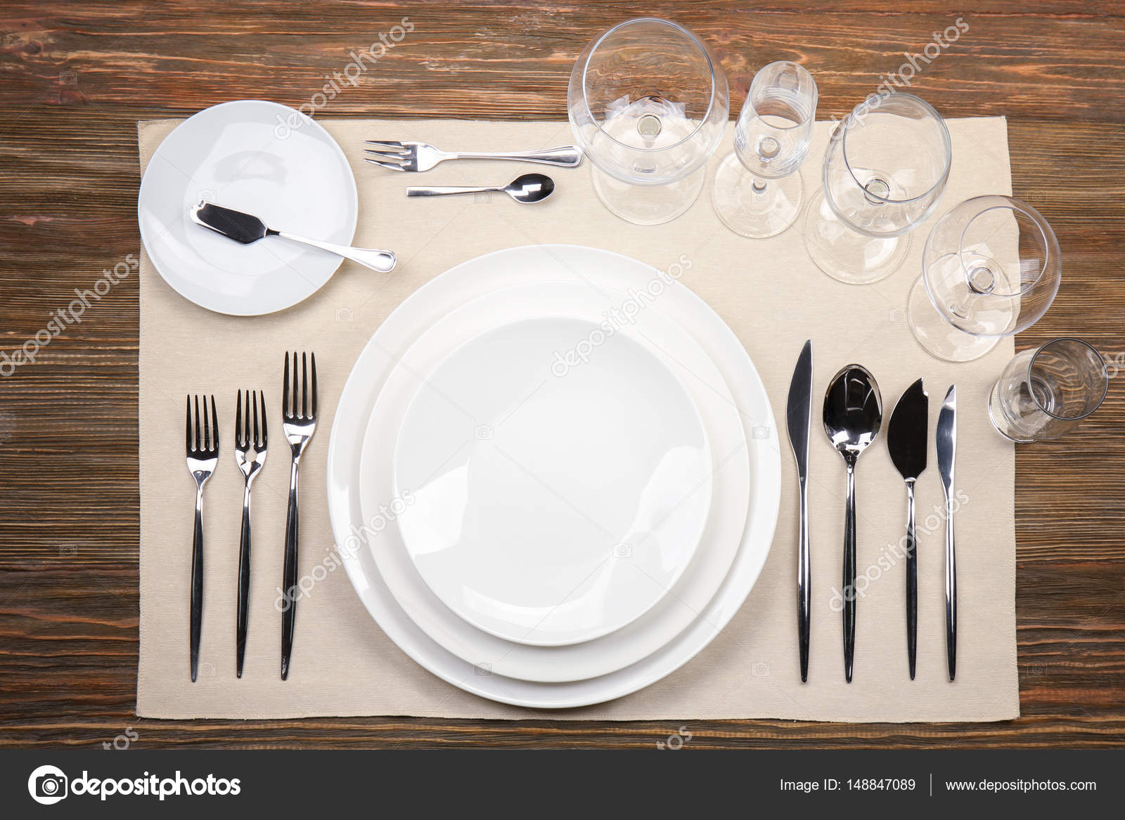 Beautiful table setting Stock Photo by ©belchonock 148847089