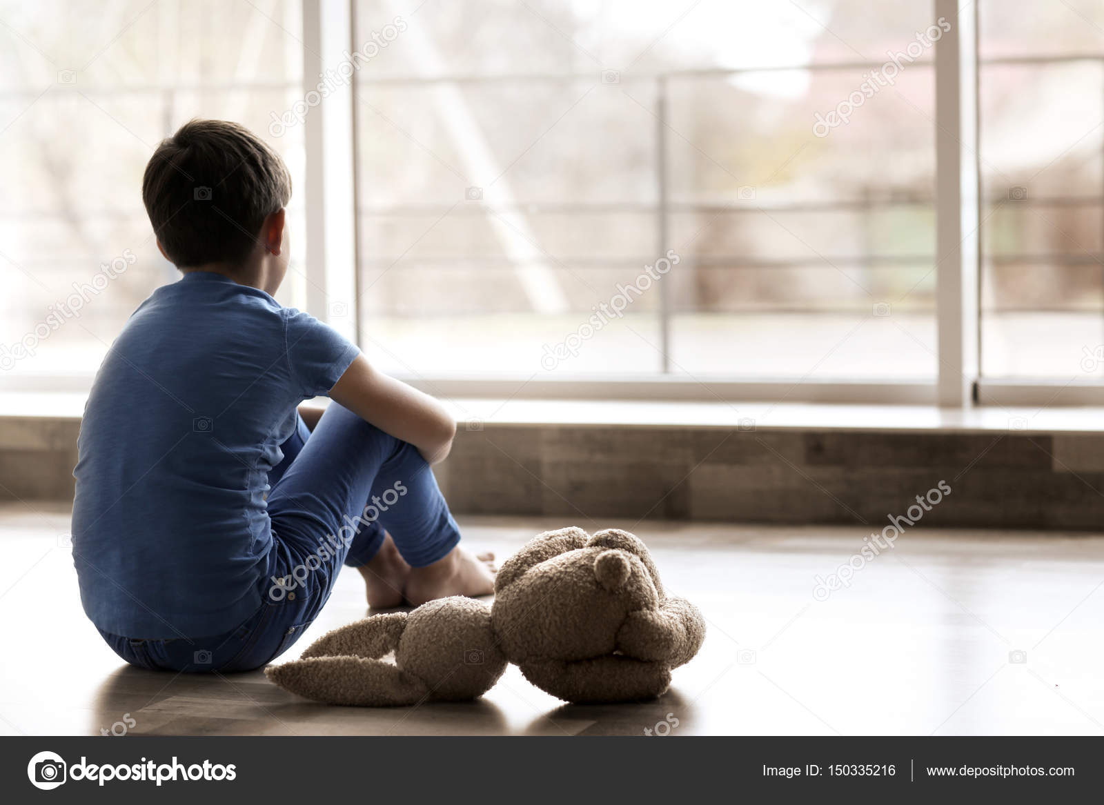 Sad little boy Stock Photo by ©belchonock 150335216