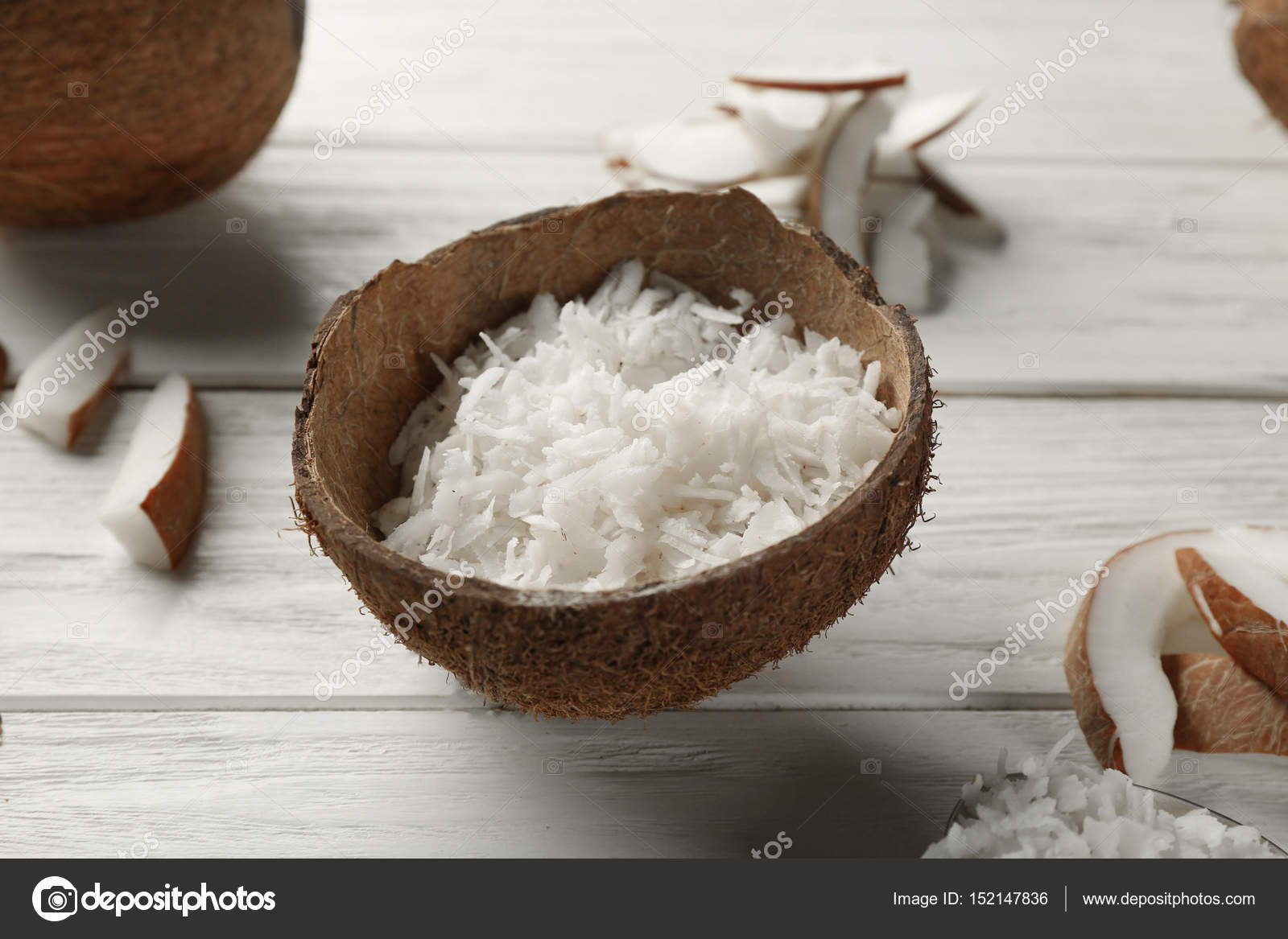 Grated coconut in shell Stock Photo by ©belchonock 152147836