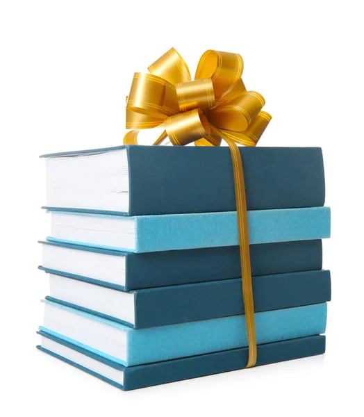 Stack of books with ribbon Stock Photo by ©belchonock 152140398