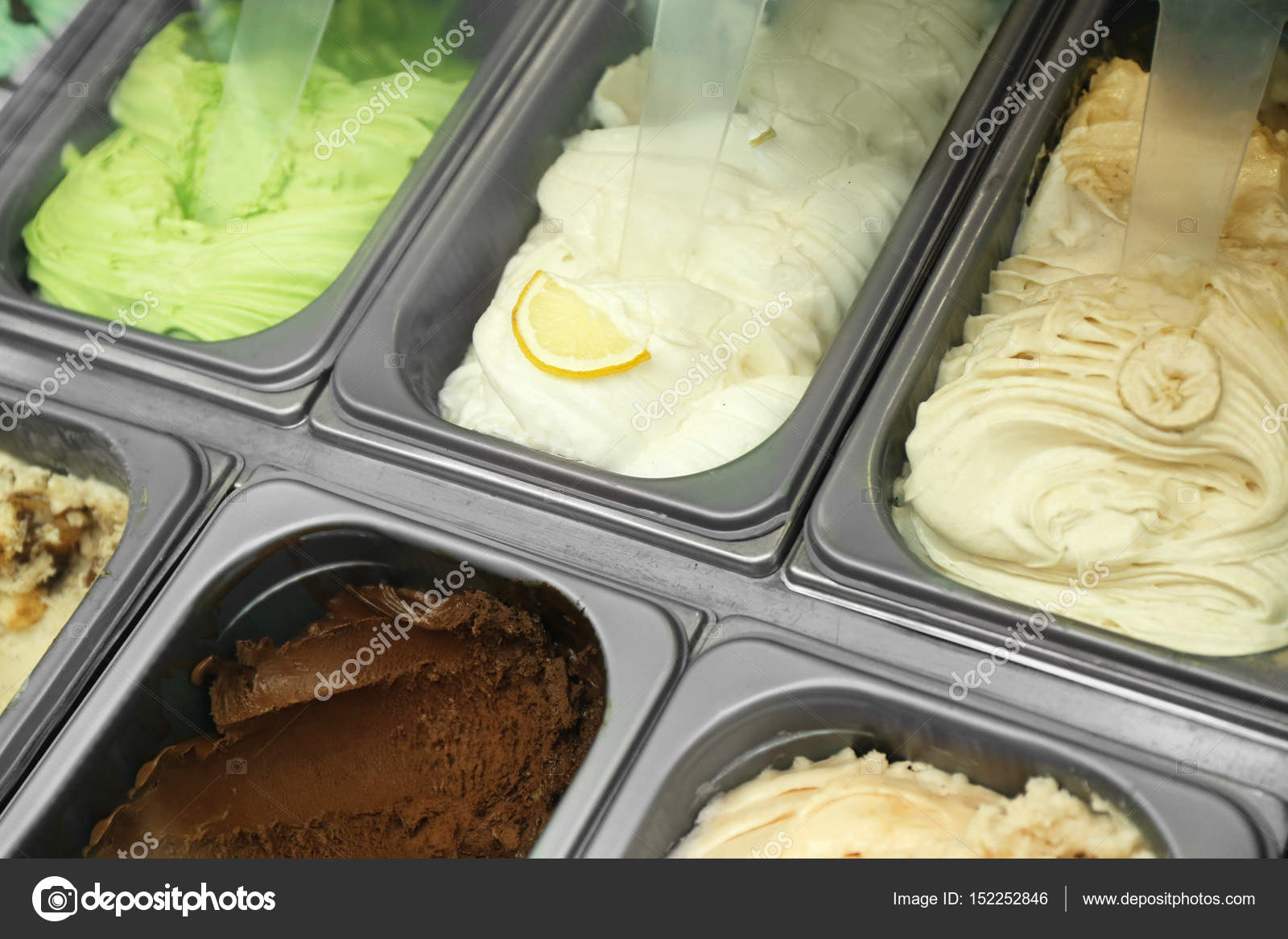 Ice cream in metal tubs — Stock Photo © belchonock #152252846