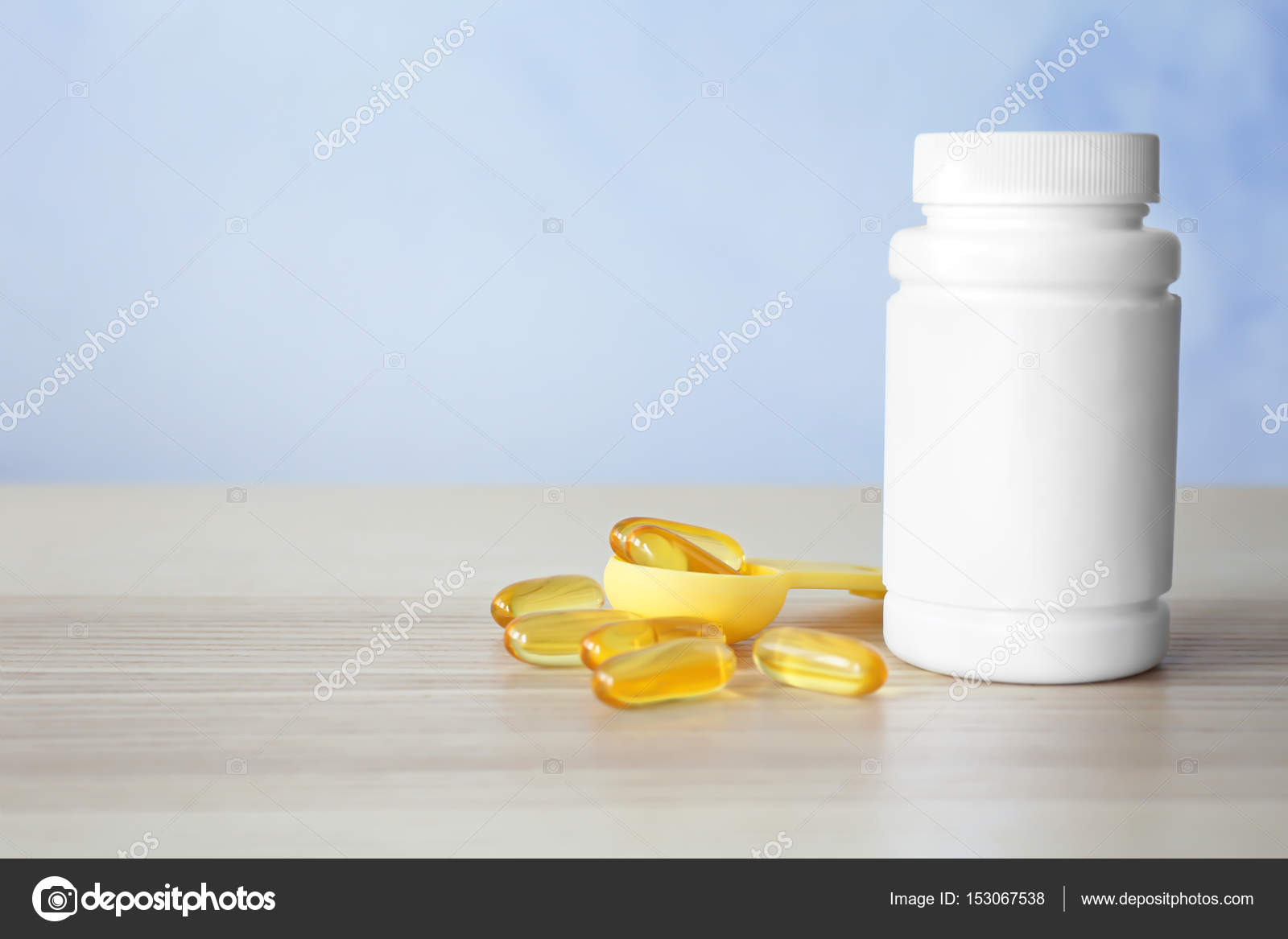 Fish oil capsules Stock Photo by ©belchonock 153067538