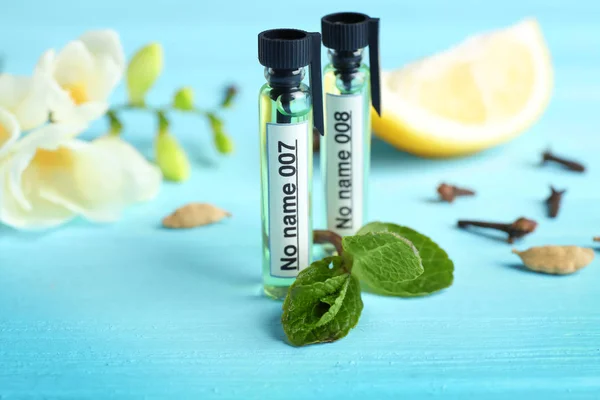 Assorted perfume samples Stock Photo by ©belchonock 153468302