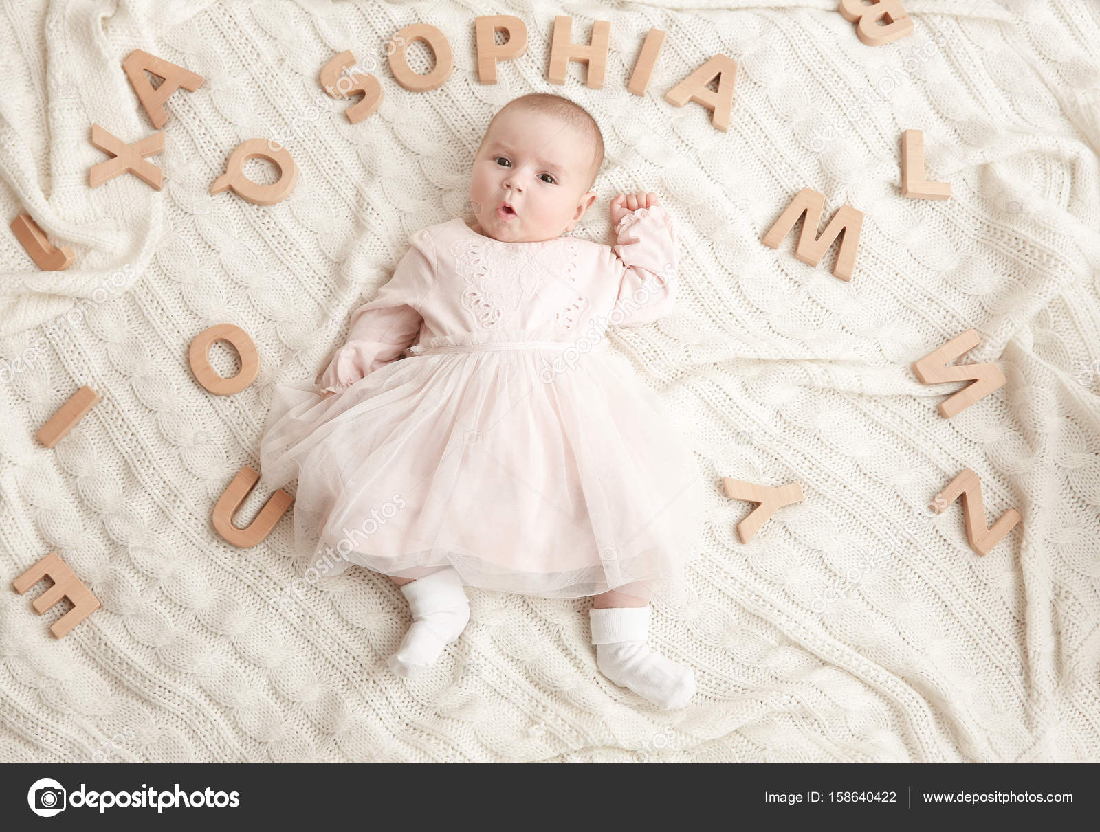 Cute baby with word Stock Photo by ©belchonock 158640422