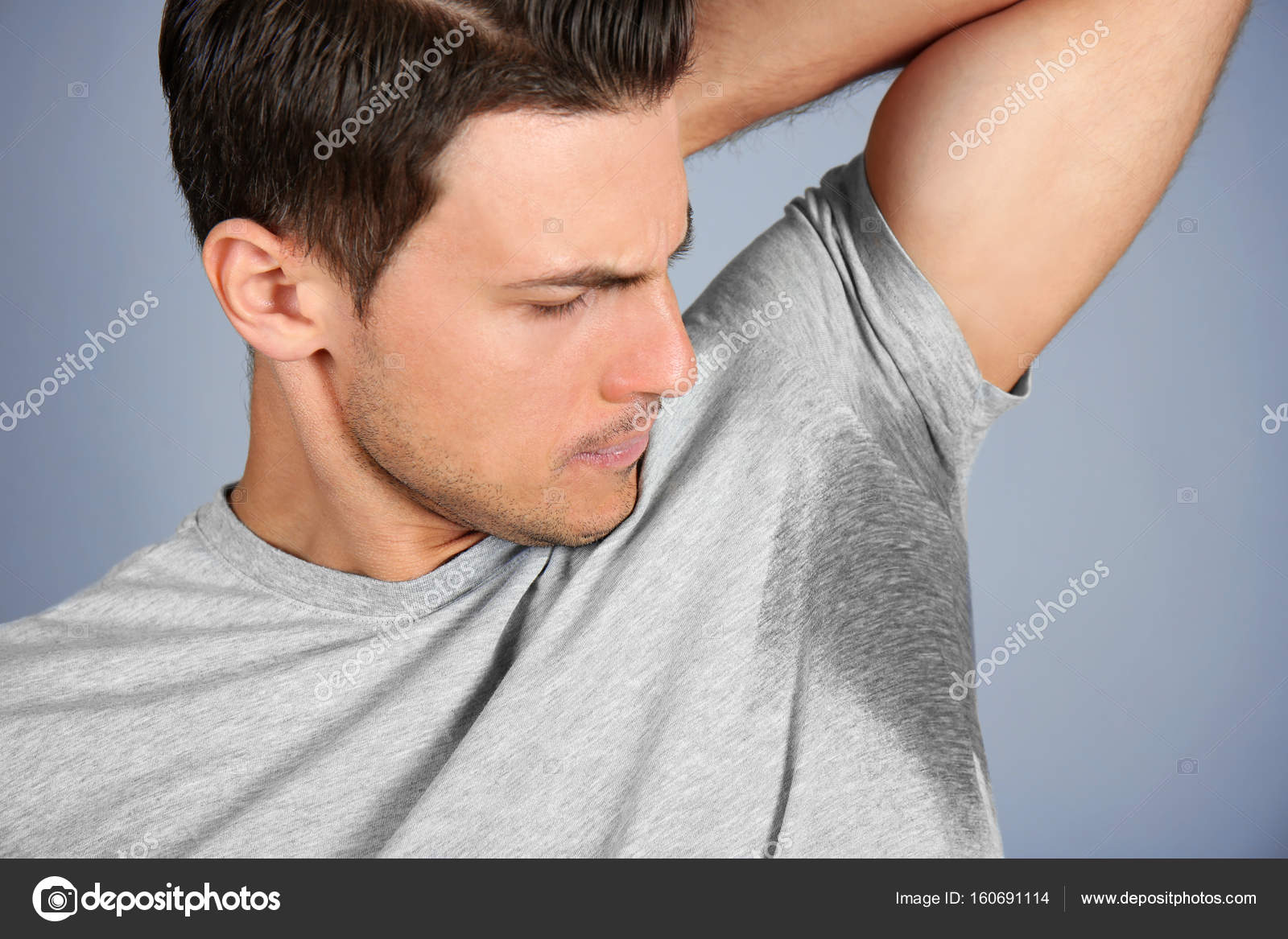 Man with wet spot on clothes Stock Photo by ©belchonock 160691114