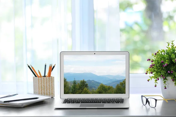 Workplace wallpaper | Workplace with laptop and wallpaper on screen ...