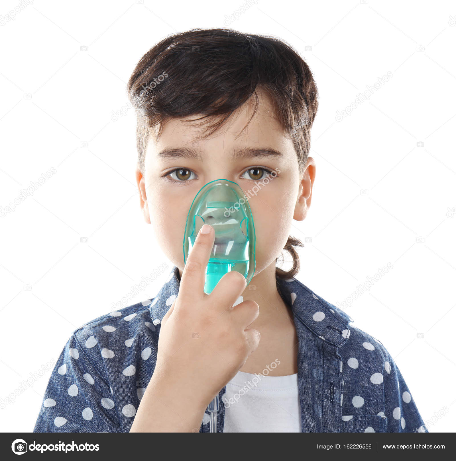Boy using asthma machine Stock Photo by ©belchonock 162226556