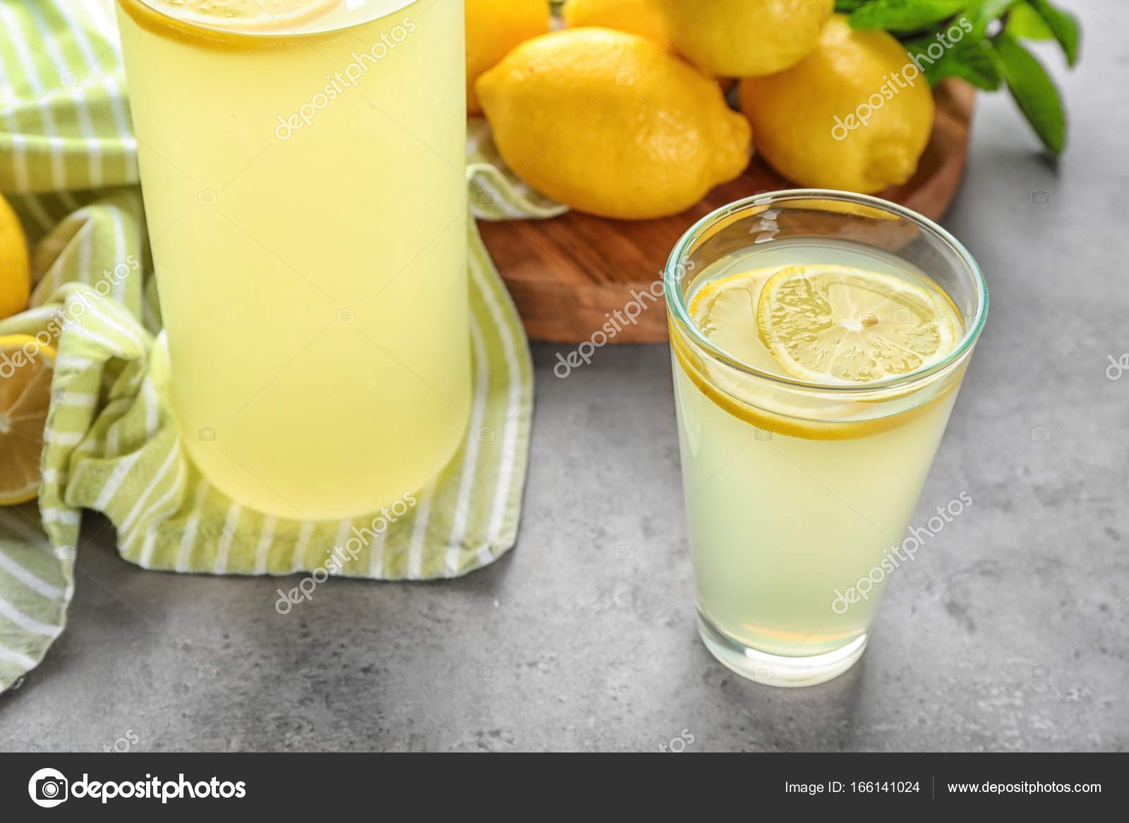 Glass of lemon juice — Stock Photo © belchonock #166141024