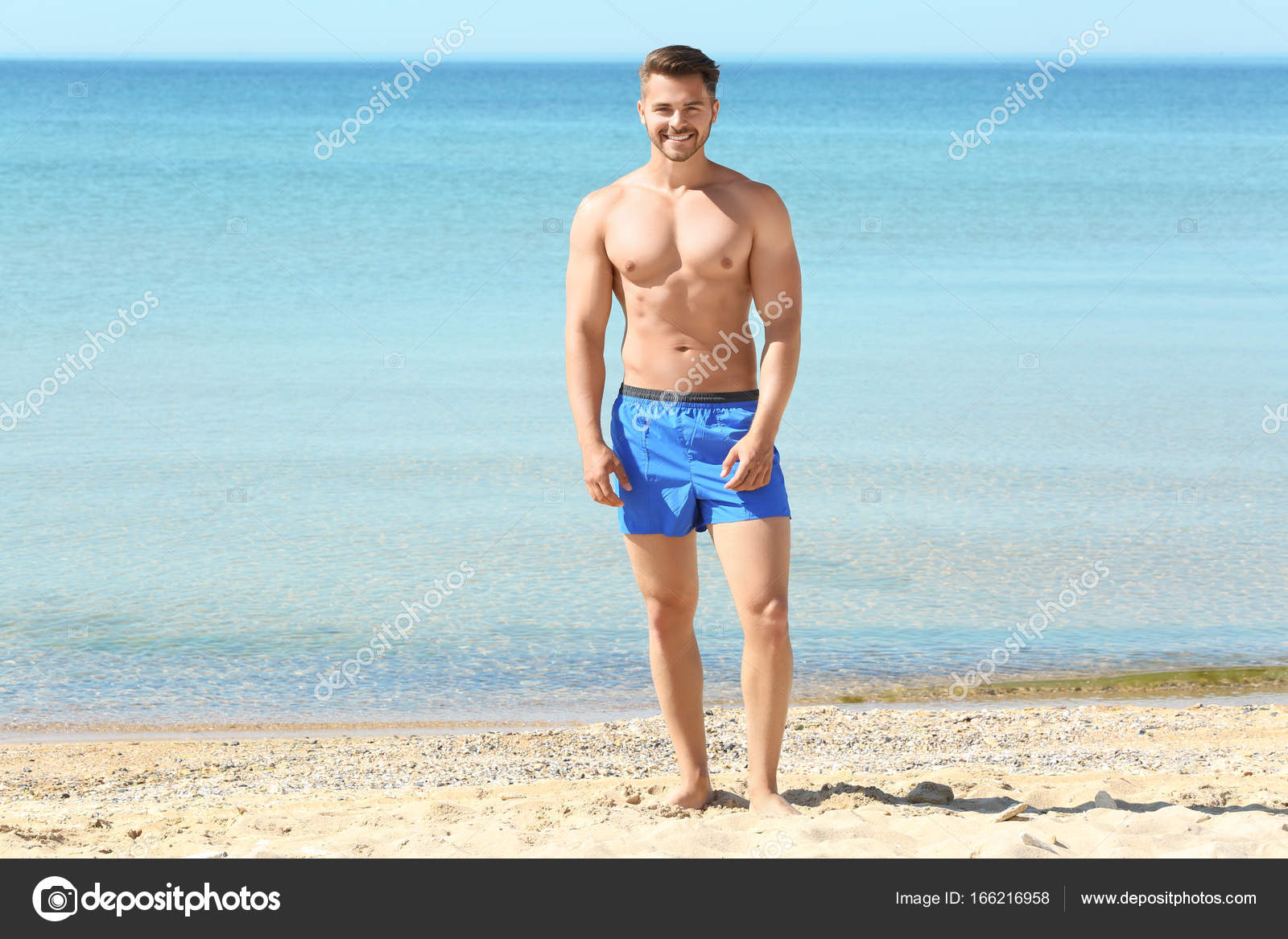 Handsome Young Man At The Beach