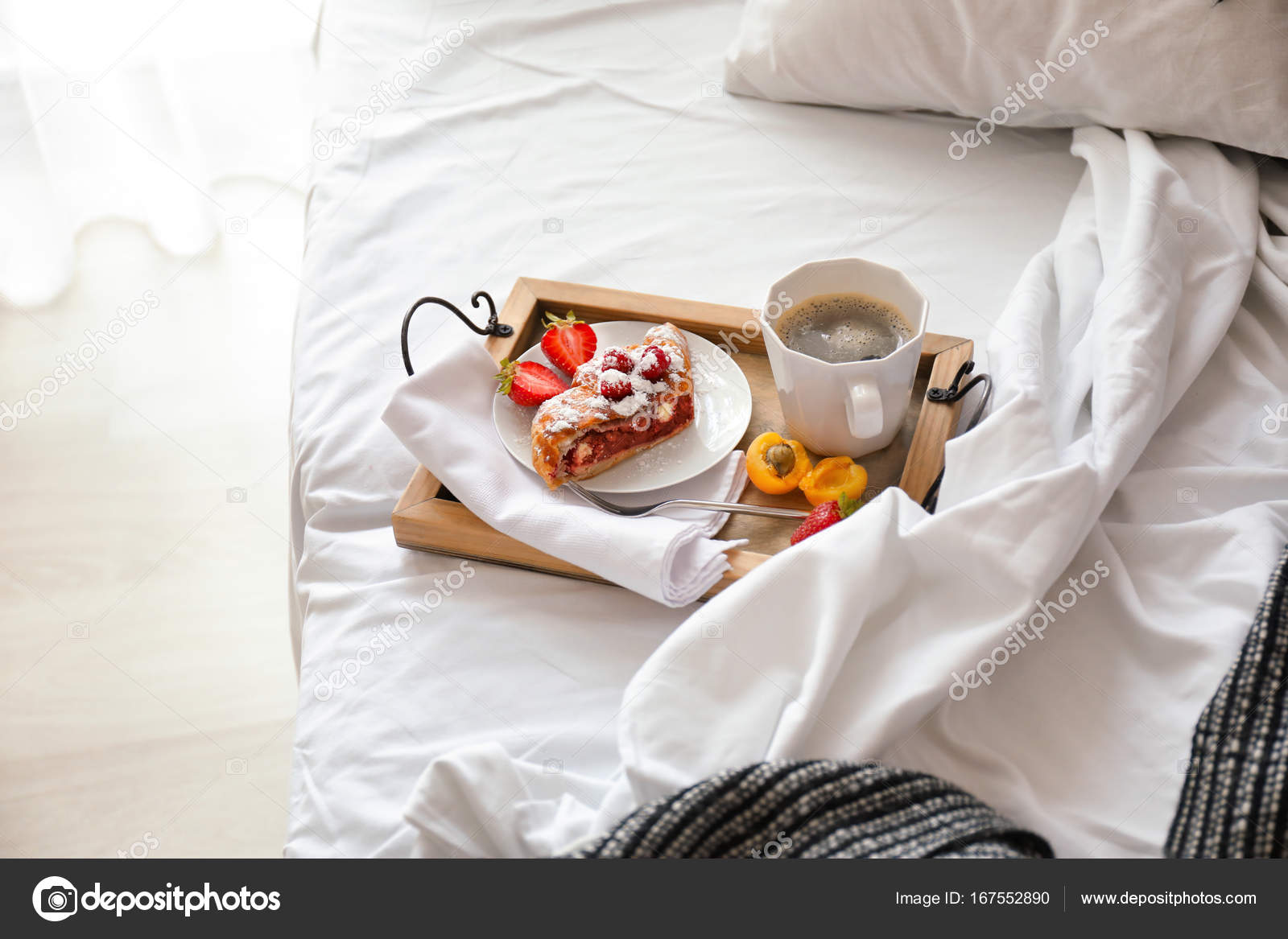 Delicious breakfast on bed — Stock Photo © belchonock #167552890