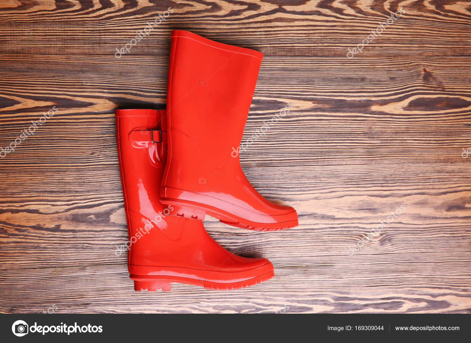 Red rubber boots Stock Photo by ©belchonock 169309044