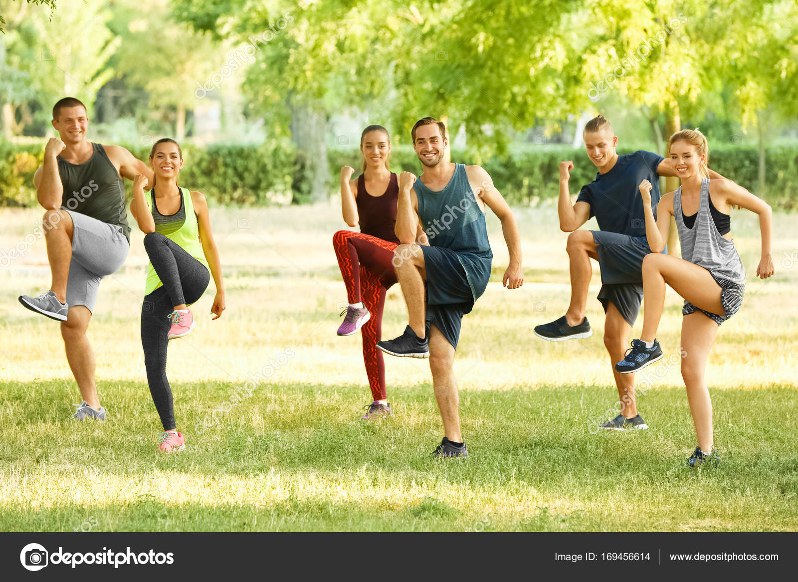 Group of young people doing exercise outdoors Stock Photo by ... Group of young people doing exercise outdoors Stock Photo by ...
