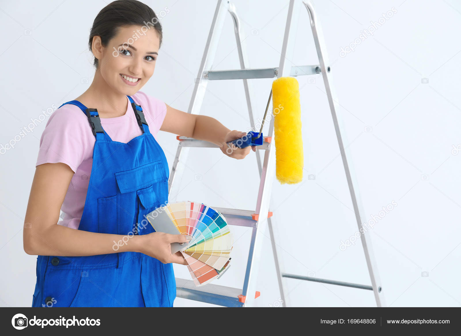 Young female decorator — Stock Photo © belchonock #169648806