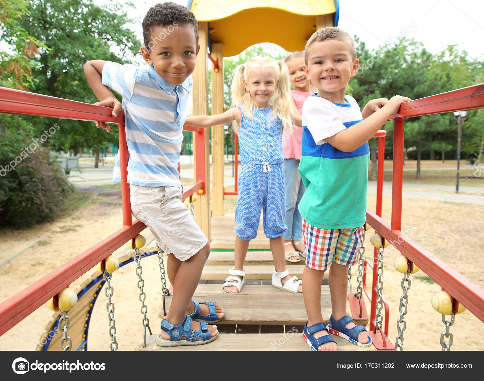 Cute children on playground — Stock Photo © belchonock #170311202