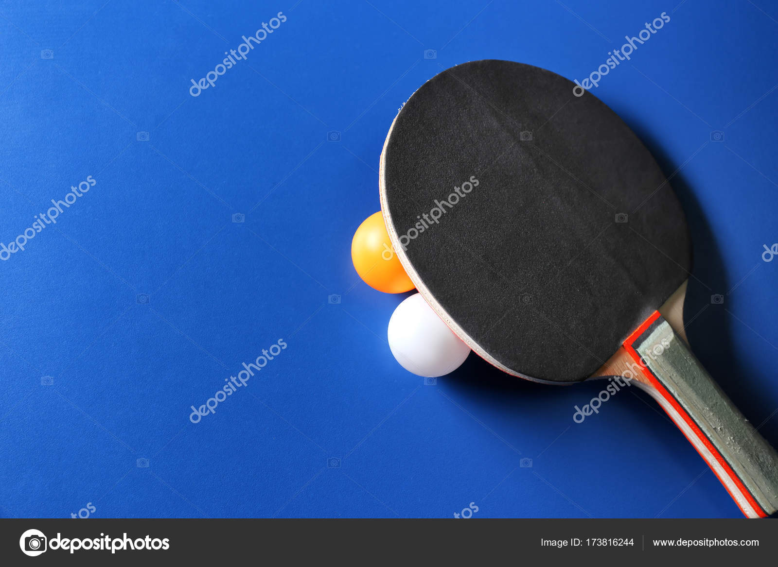 Ping pong racket and balls on blue background Stock Photo by ...