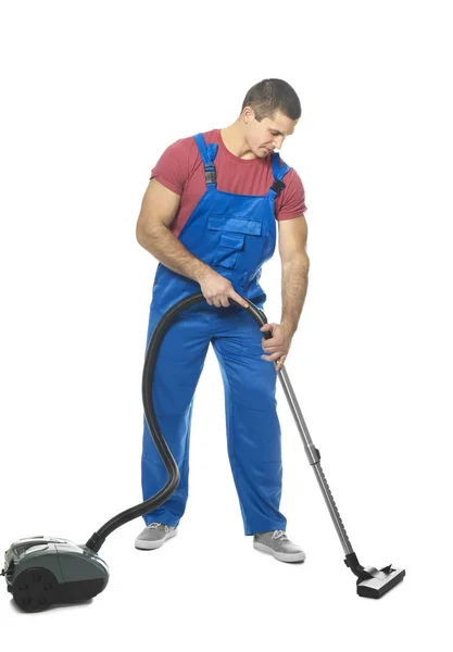 Pictures : vacuums | Young man with vacuum cleaner — Stock Photo ...