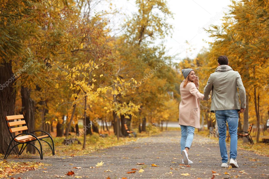 Young Couple Walking Park Autumn Day — Stock Photo © belchonock #175674152
